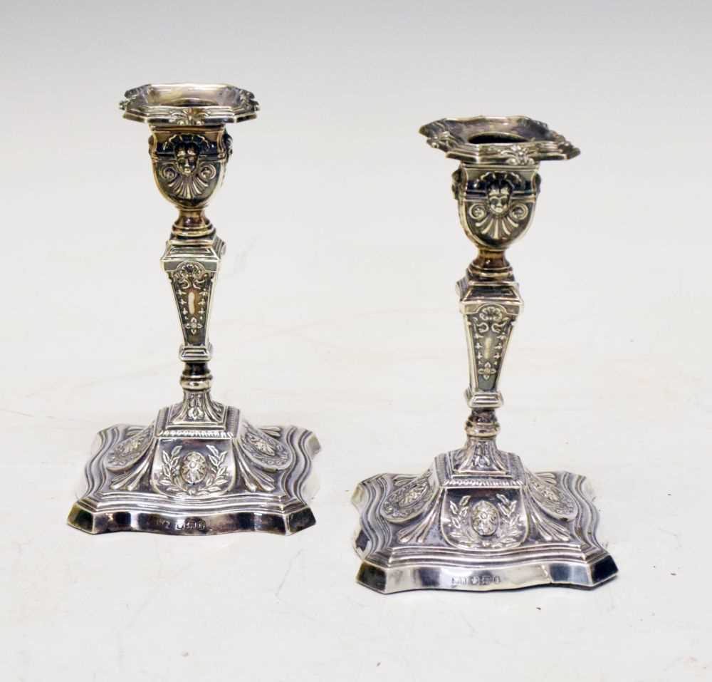 Lot 139 - Pair of late Victorian silver candlesticks