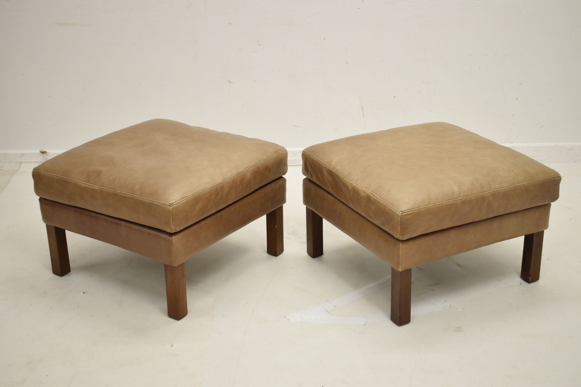 Lot 496 - Pair of tan leather club style wing