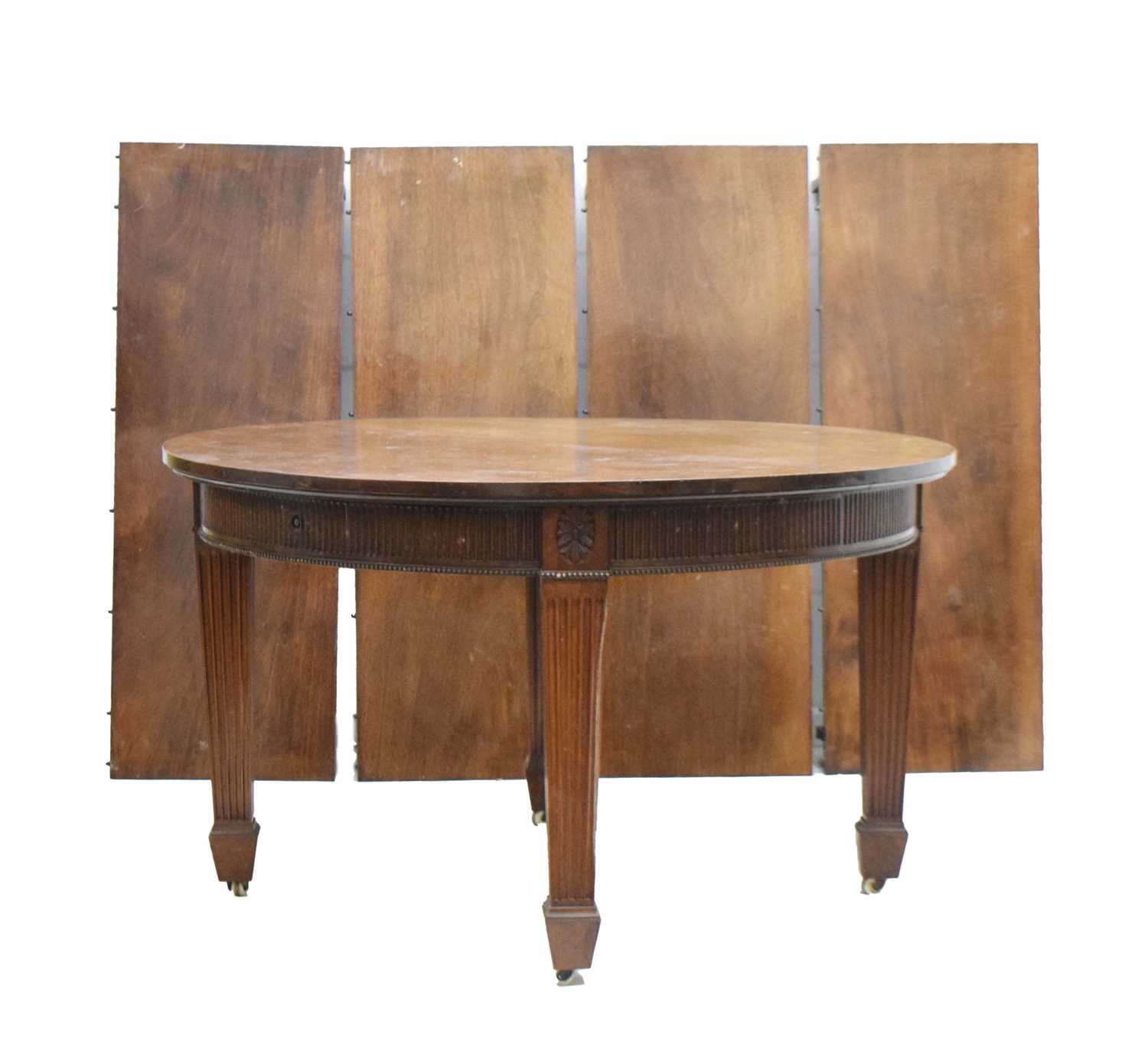 Lot 497 - Edwardian mahogany wind-out extending D-end